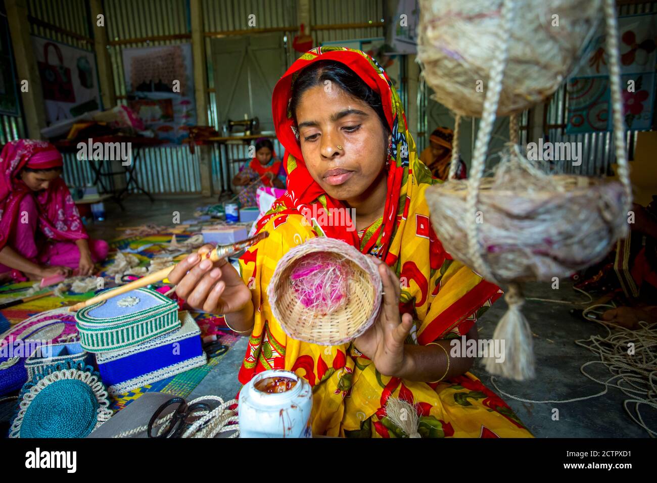 Bangladesh – May 14, 2018: Handicraft maker women are making on a ...