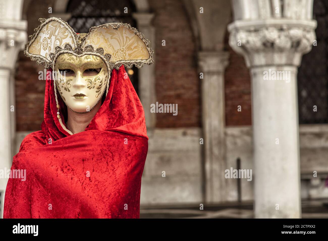 Woman wearing a mysterious mask Stock Photo - Alamy