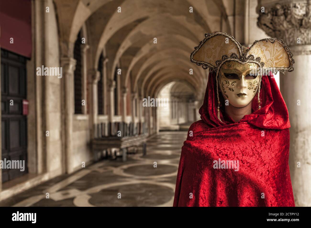 Woman wearing a mysterious mask Stock Photo - Alamy