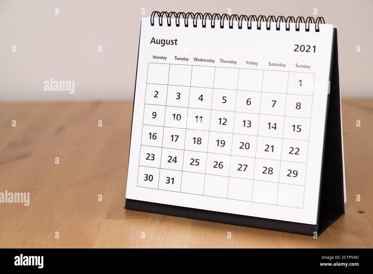 Month page: August in 2021 paper calendar on the wooden table Stock ...