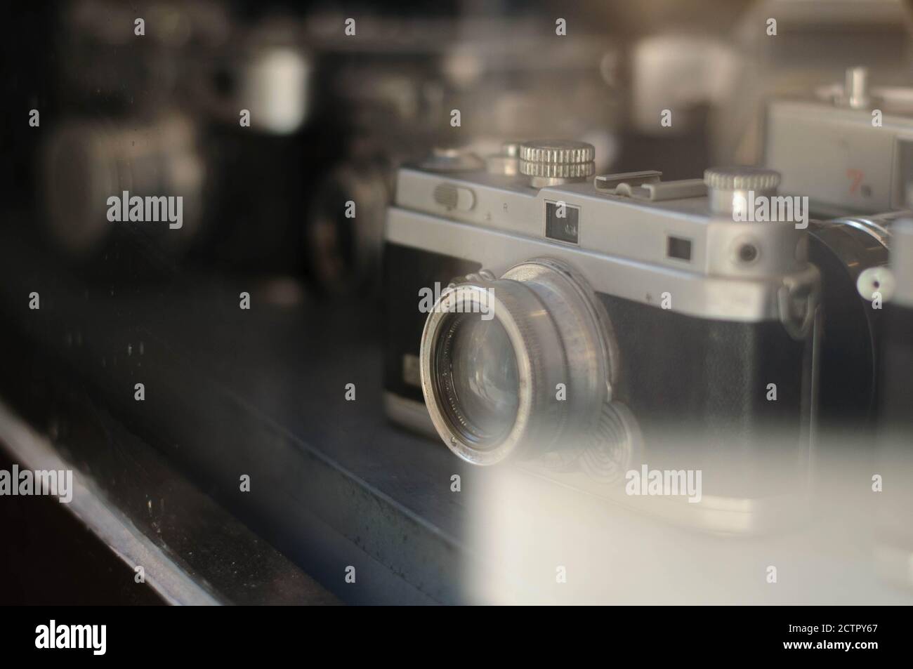 old photo cameras in the shop window Stock Photo - Alamy