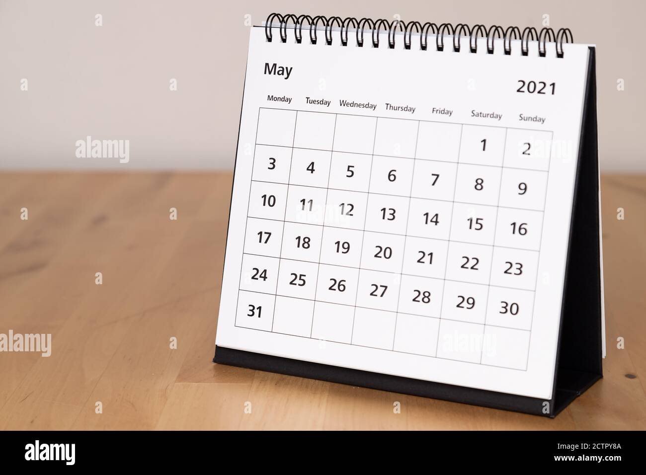 Month page: May in 2021 paper calendar on the wooden table Stock Photo ...