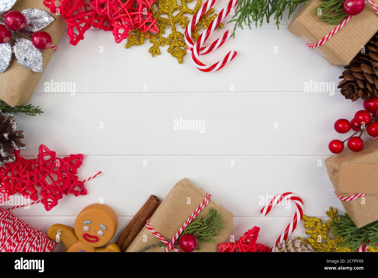 Christmas background with festive decorations on white wooden table ...