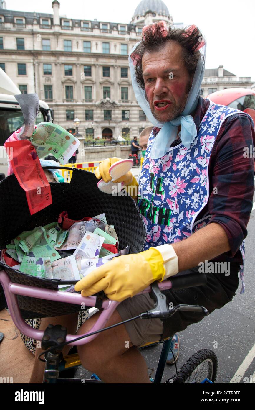 Extinction Rebellion ‘Dirty Scrubbers’ old fashioned washer women in ...