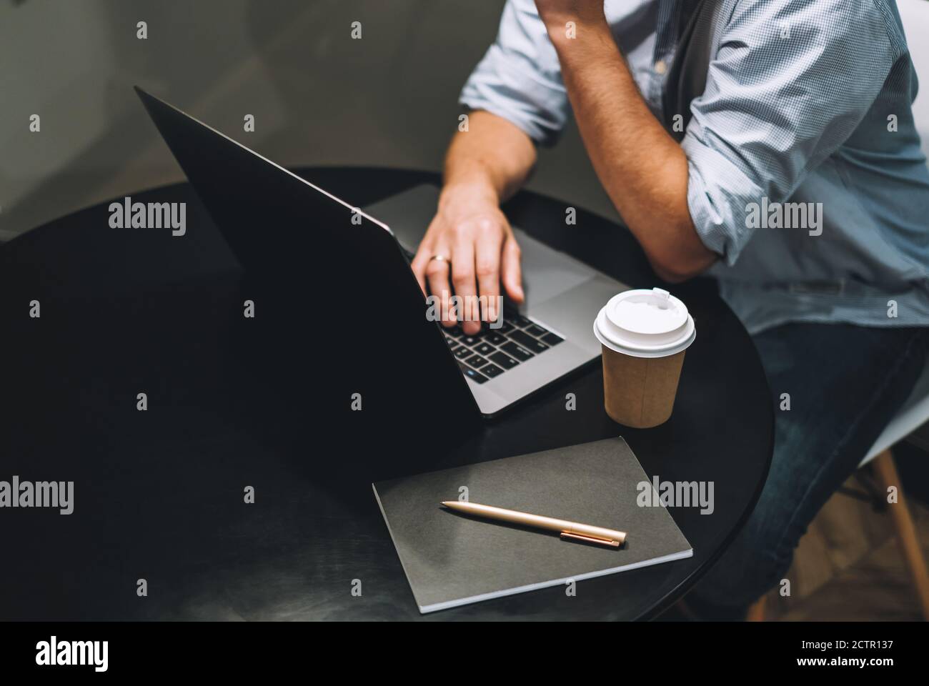 Businessman at work, thinking and looking on the screen. Man working on ...