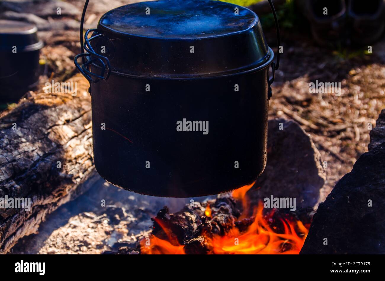 Cooking on fire in campaign hi-res stock photography and images - Alamy