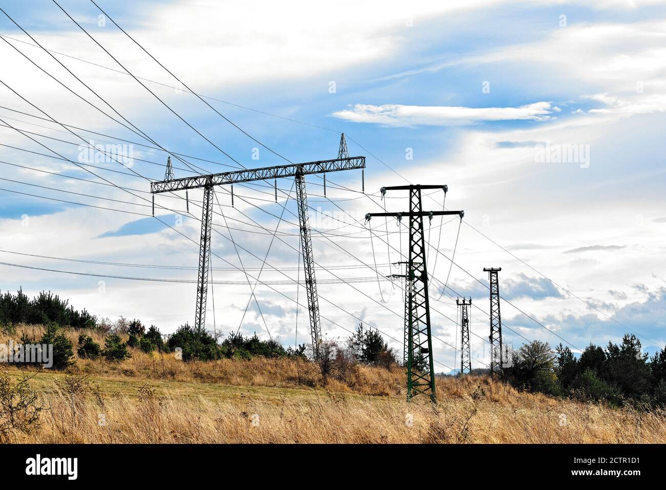 High voltage power line poles Stock Photo - Alamy