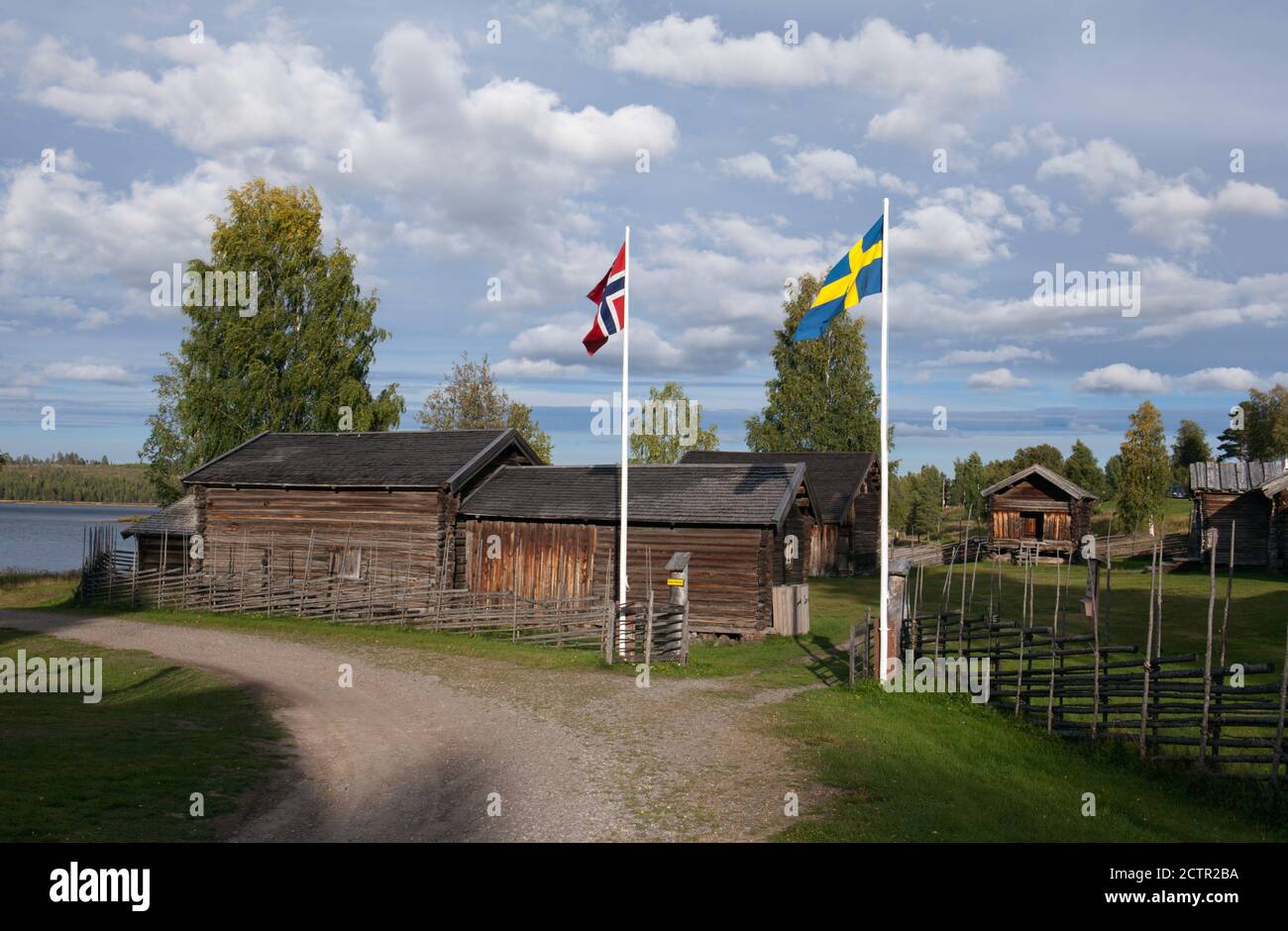View of wooden buildings in an outdoor, public museum. Ancient ...
