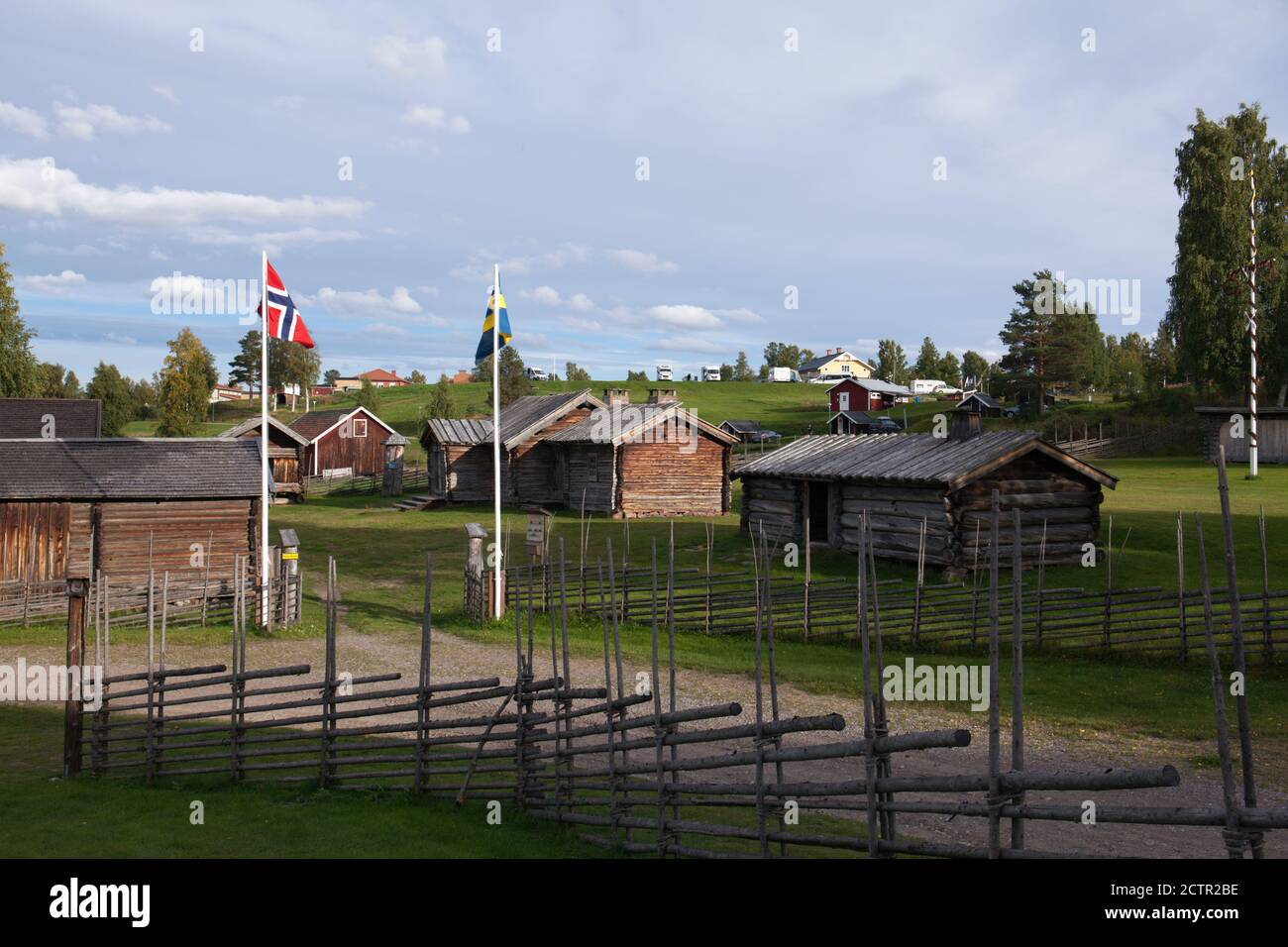 View of wooden buildings in an outdoor, public museum. Ancient ...