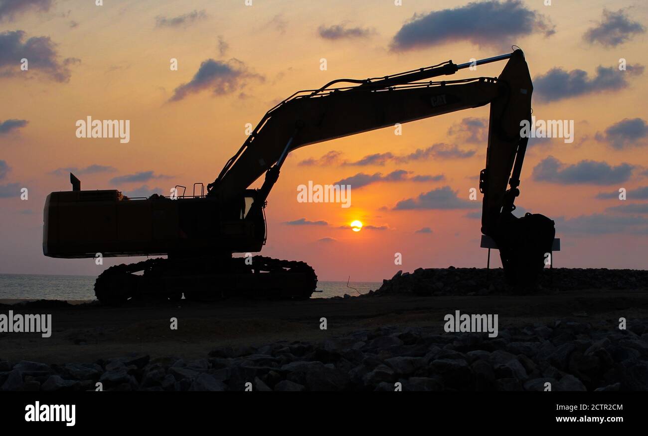 Background image of construction site during sunset Stock Photo - Alamy