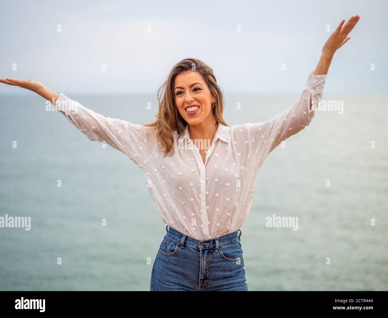 Celebrating pose hi-res stock photography and images - Alamy