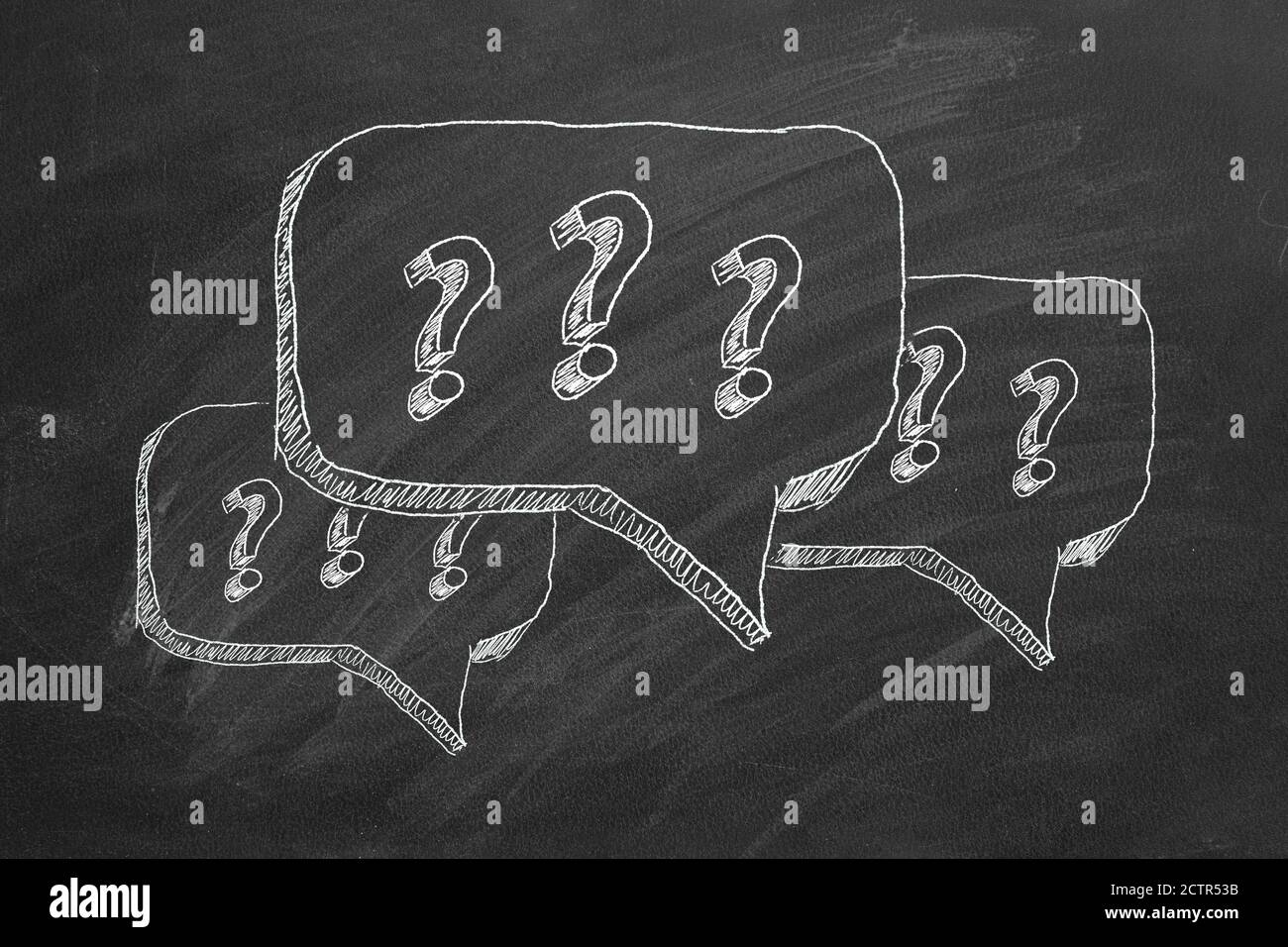 Hand drawing question marks on blackboard Stock Photo - Alamy