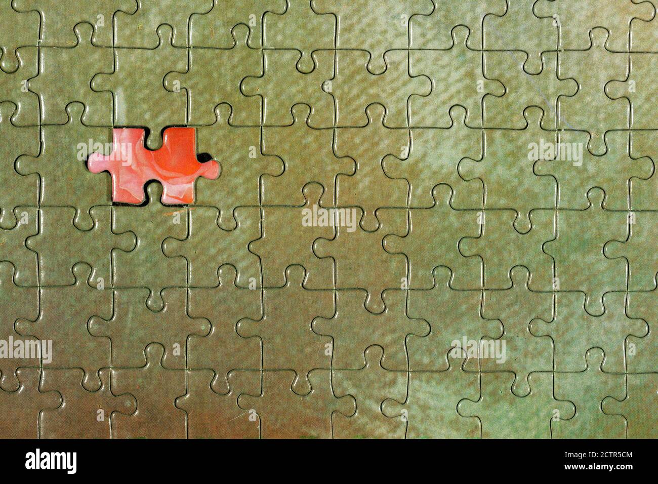 Disassembled puzzle with a last wrong piece impossible to fill Stock ...