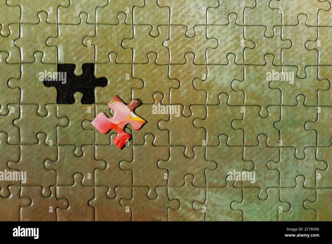 Disassembled puzzle with a last wrong piece impossible to fill Stock ...