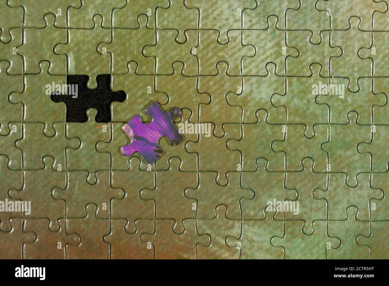 Disassembled puzzle with a last wrong piece impossible to fill Stock ...