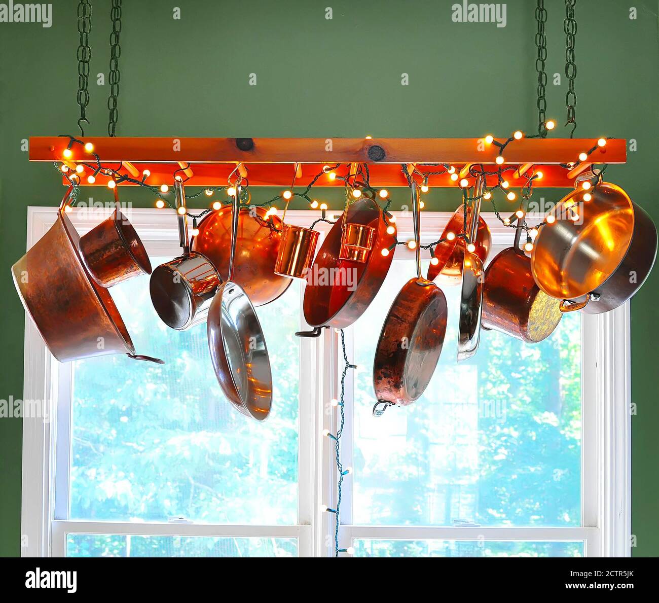 Hanging pans in kitchen hi-res stock photography and images - Alamy