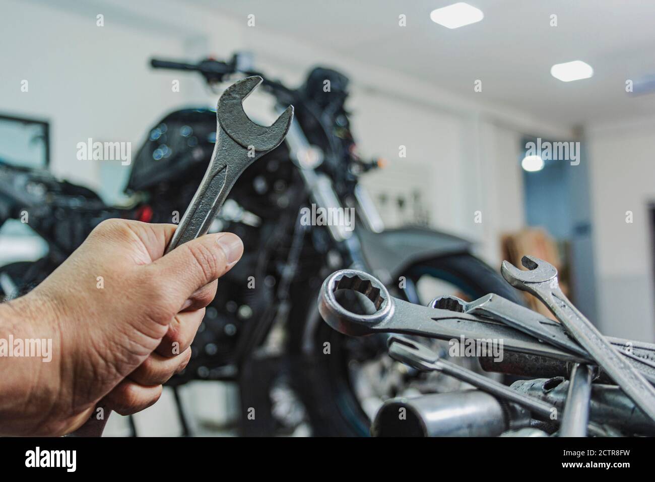 Hands holding tools equipment hi-res stock photography and images - Alamy