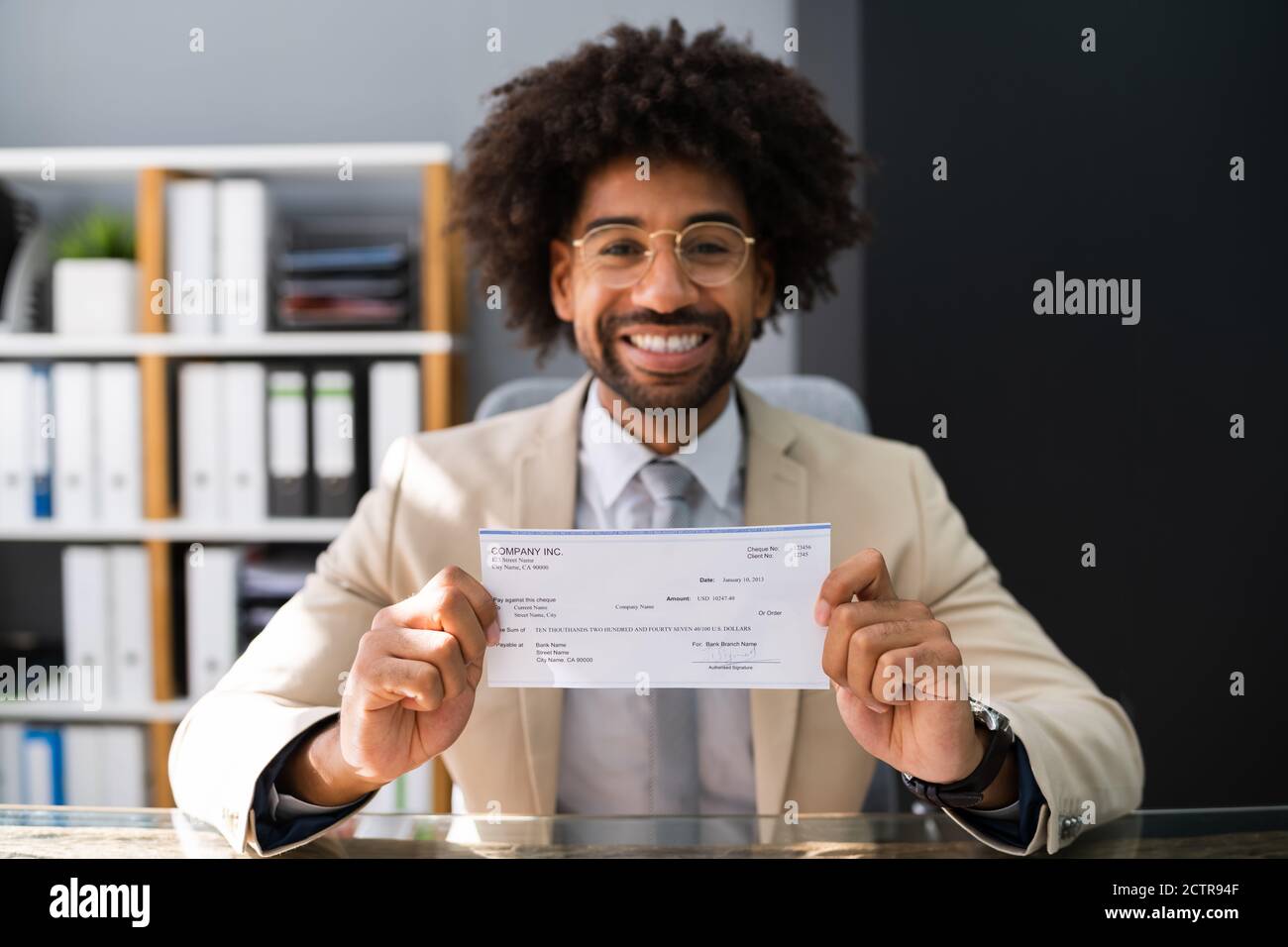 Holding Paycheck Or Payroll Check. Insurance Cheque In Hand Stock Photo ...