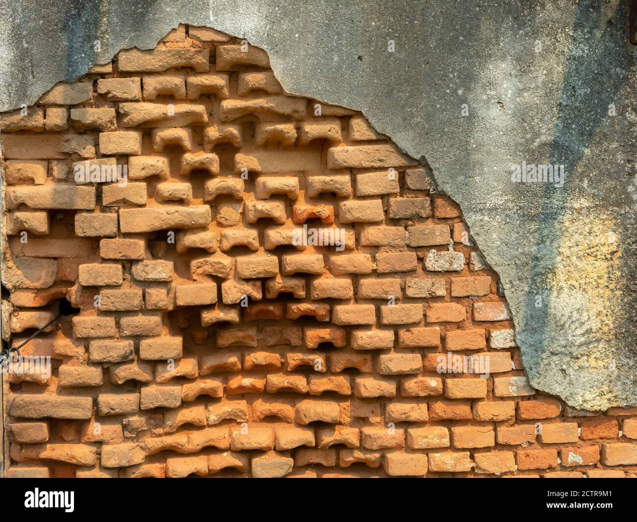 Old damaged abandoned brick wall Stock Photo - Alamy