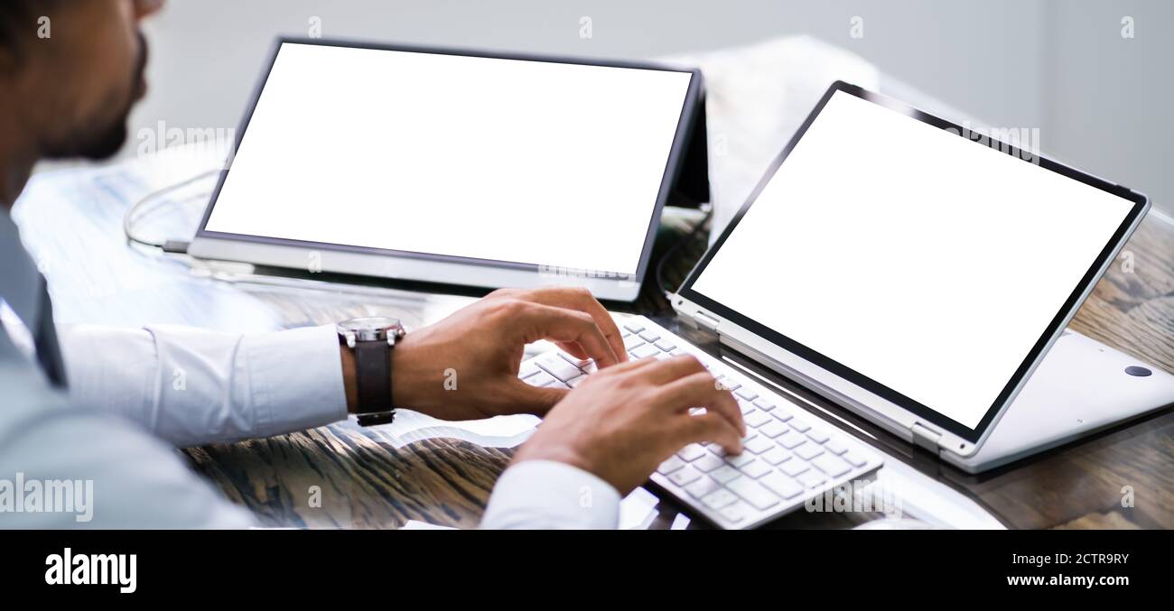 African American Working Working On Laptop Computer Screen Stock Photo ...