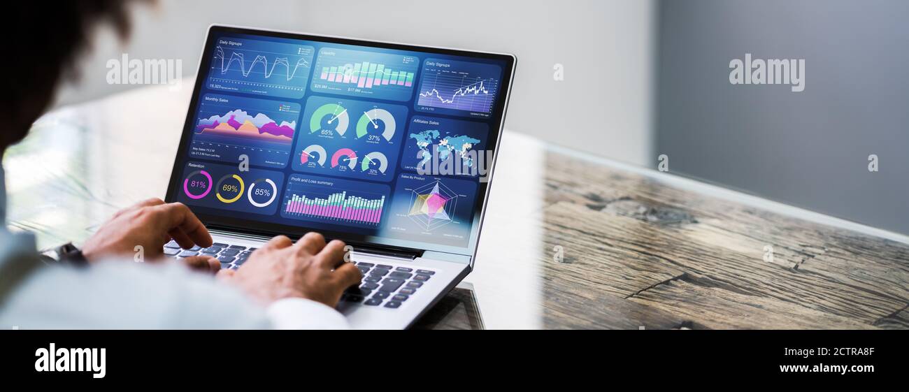 African American Data Analyst Using Data Analytics KPI Dashboard Stock ...