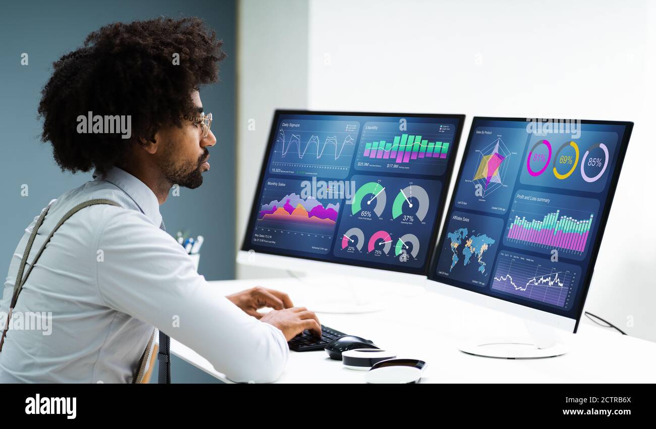 Business Data Analyst Using Computer. African American Advisor Stock ...