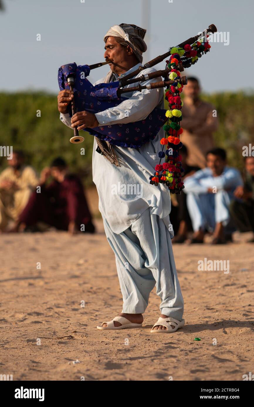 Bagpipe player announces the beginning of the Kushti wrestling ...