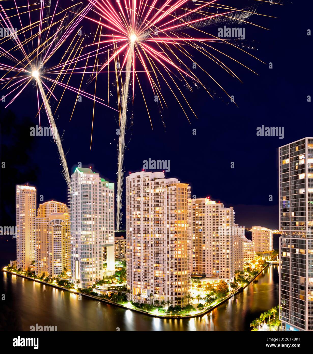 Spectacular Fireworks behind the high-rise buildings on Brickell Key ...