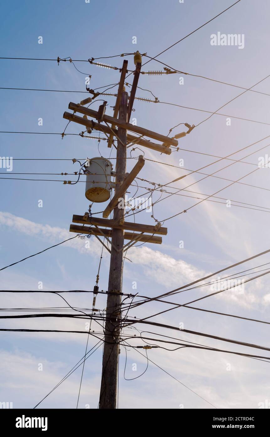 Evening Sunlight On Electrical Service Poles Stock Photo - Alamy