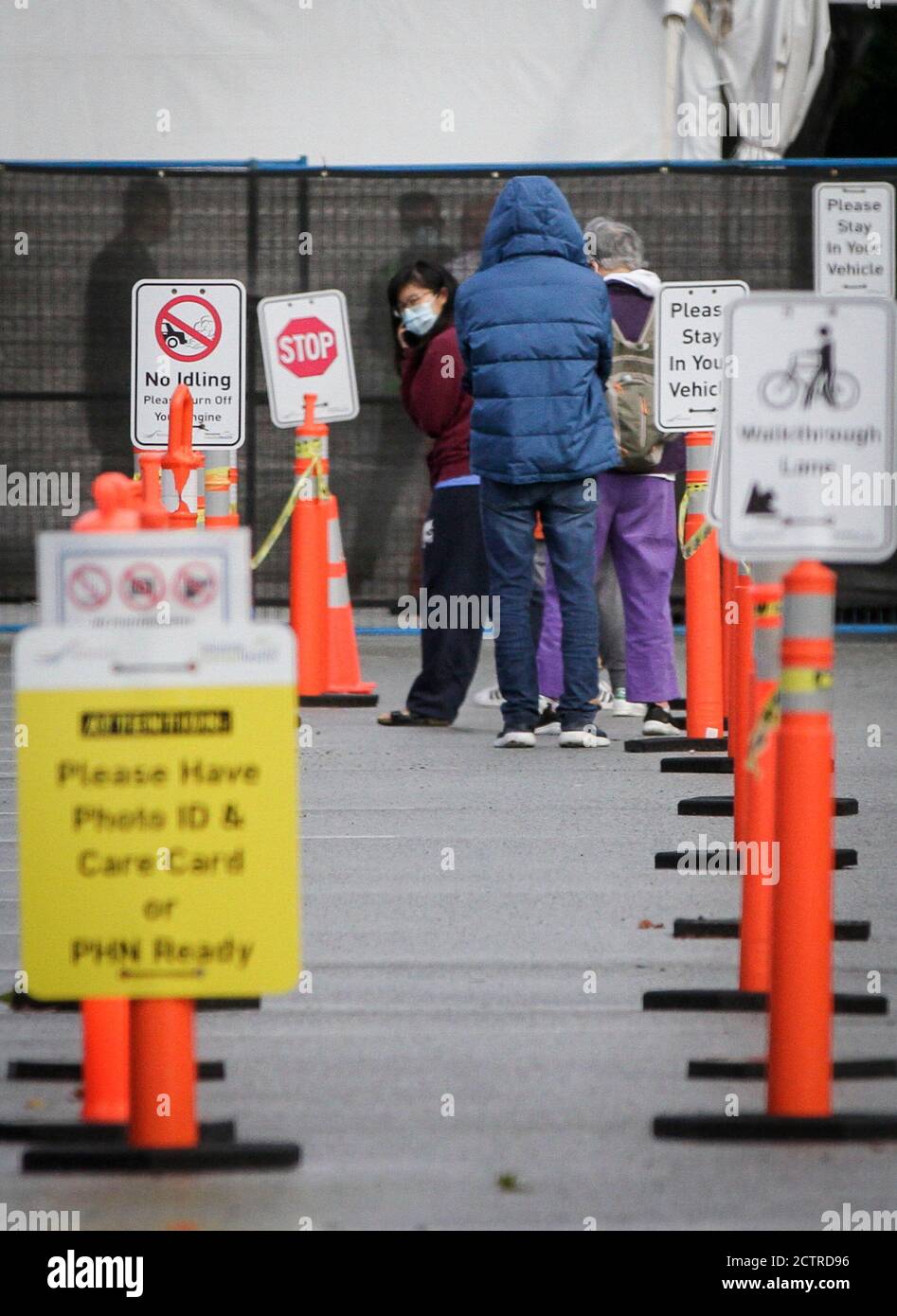 Vancouver, Canada. 24th Sep, 2020. People line up to take COVID-19 test ...