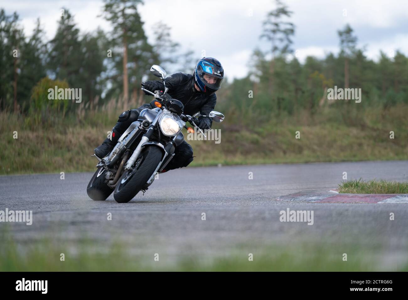 19.09.2020 Riga Latvia Handsome motorcyclist in black riding his super ...