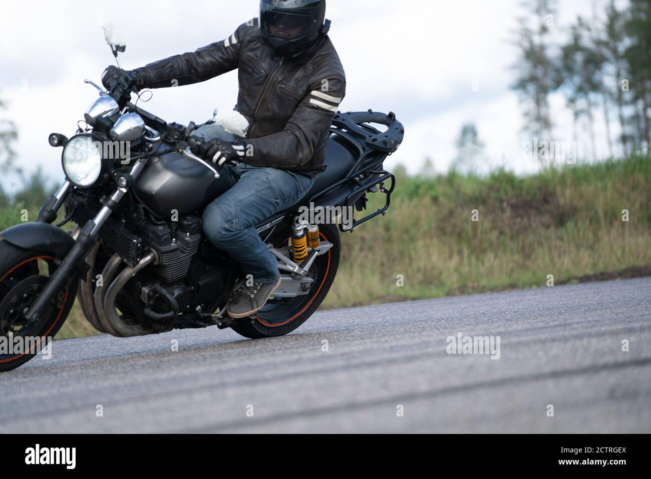 19.09.2020 Riga Latvia Handsome motorcyclist in black riding his super ...