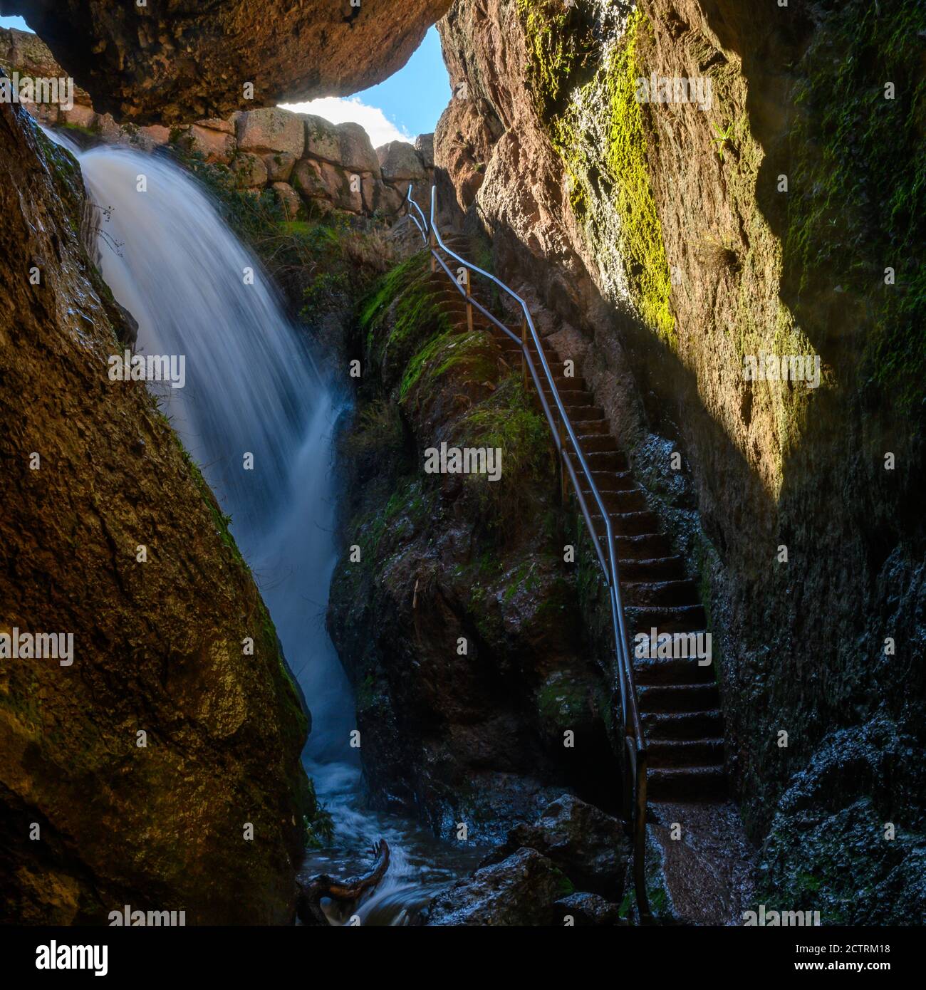 Waterfall in Cave Alongside steep staircase Stock Photo - Alamy