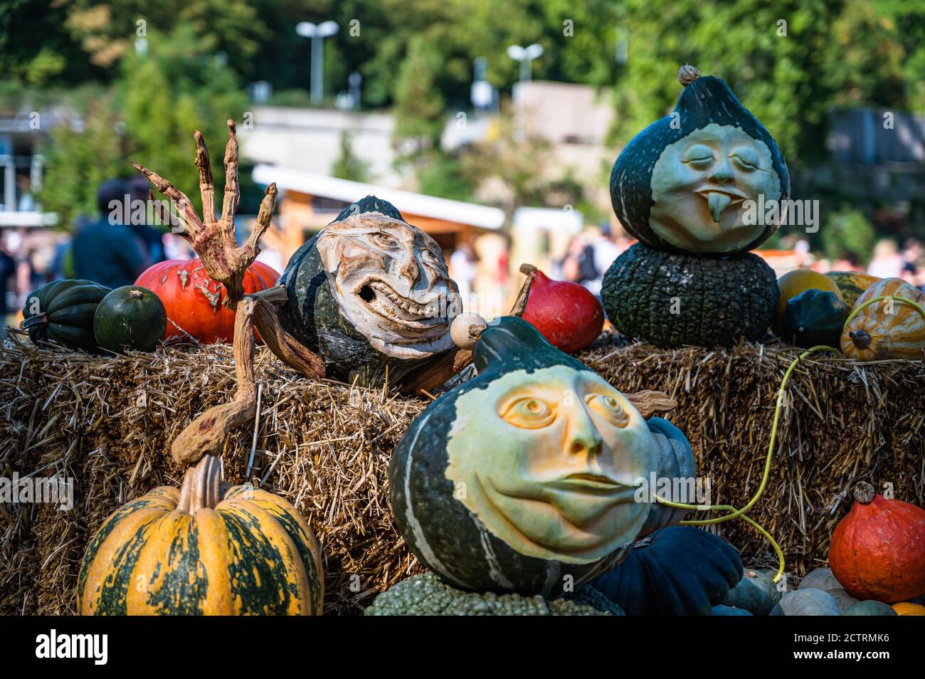 Decorative Halloween pumpkin figurines with funny faces Stock Photo - Alamy