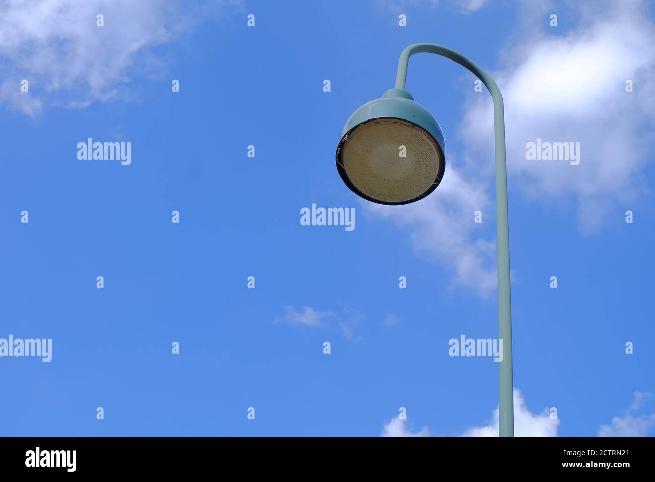 Low angle shot of a street light post on a blue sky background Stock ...