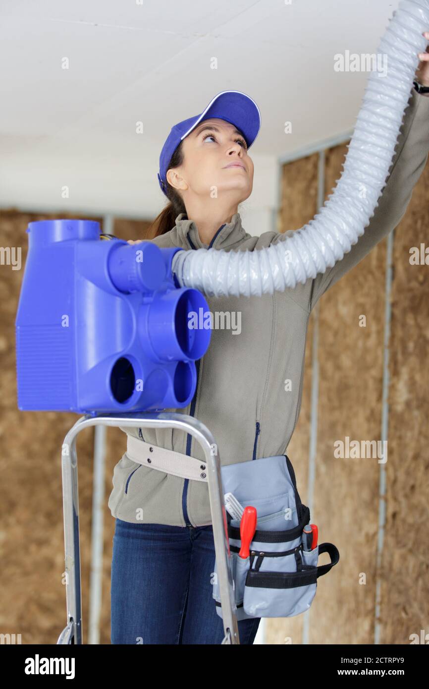 architect engineer working avec ventilation pipes Stock Photo - Alamy