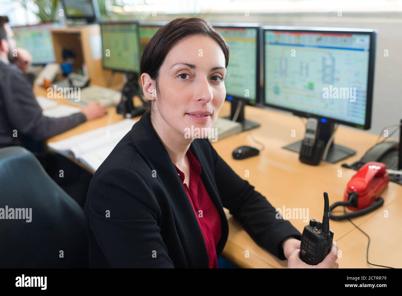 government agent is tracking fugitive with her computer Stock Photo - Alamy