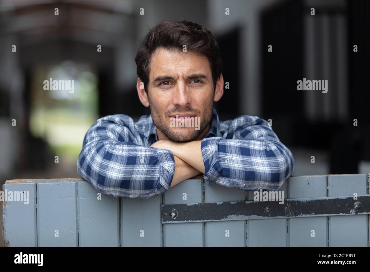 Farmer leaning on fence hi-res stock photography and images - Alamy