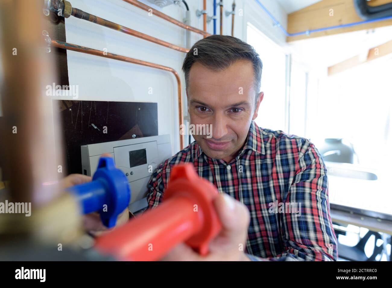 Worker in control room heavy hi-res stock photography and images - Alamy