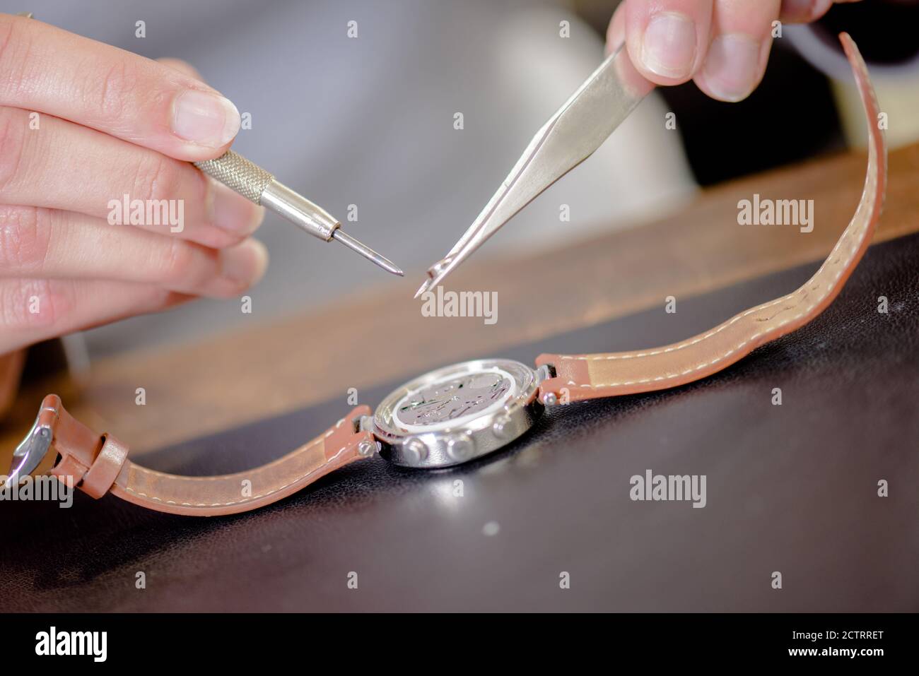 a close up of a watch being repaired Stock Photo - Alamy