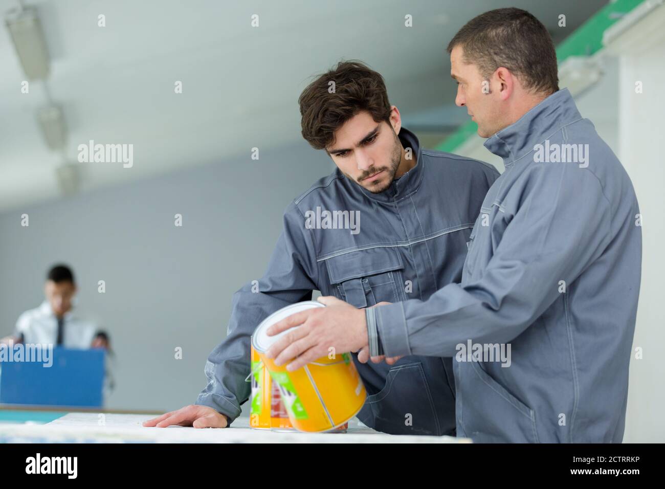 picking a color for her house walls Stock Photo - Alamy