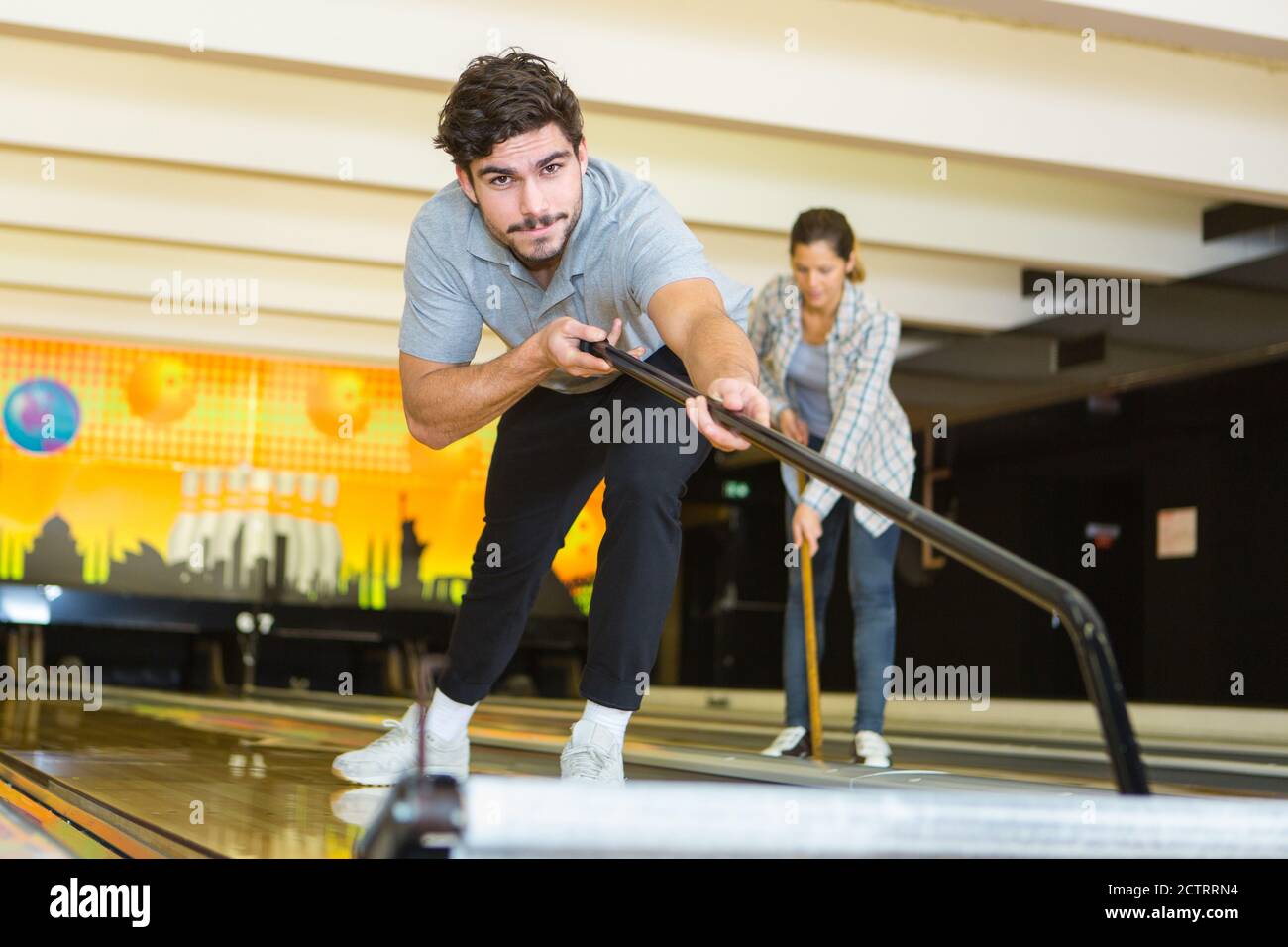 staff cleaning and preparing bowling alley Stock Photo - Alamy