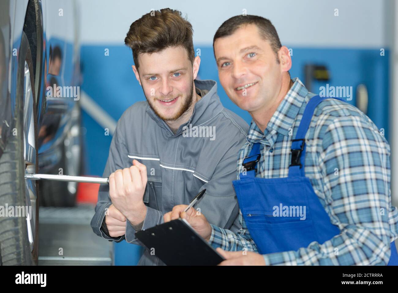 portrait of male mechanics during class Stock Photo - Alamy