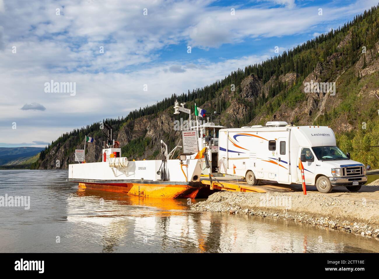 Small Ferry Crossing the River with Cars Stock Photo - Alamy