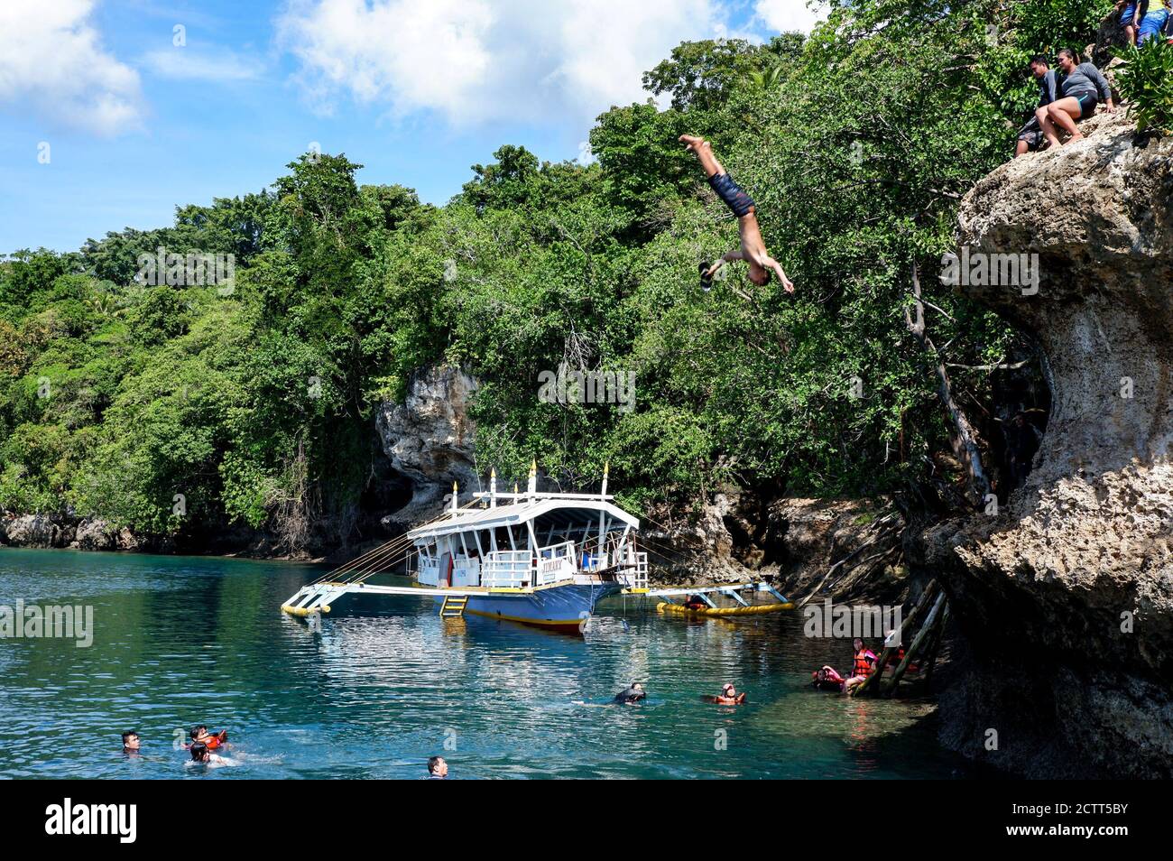 Jumping off boat hi-res stock photography and images - Alamy