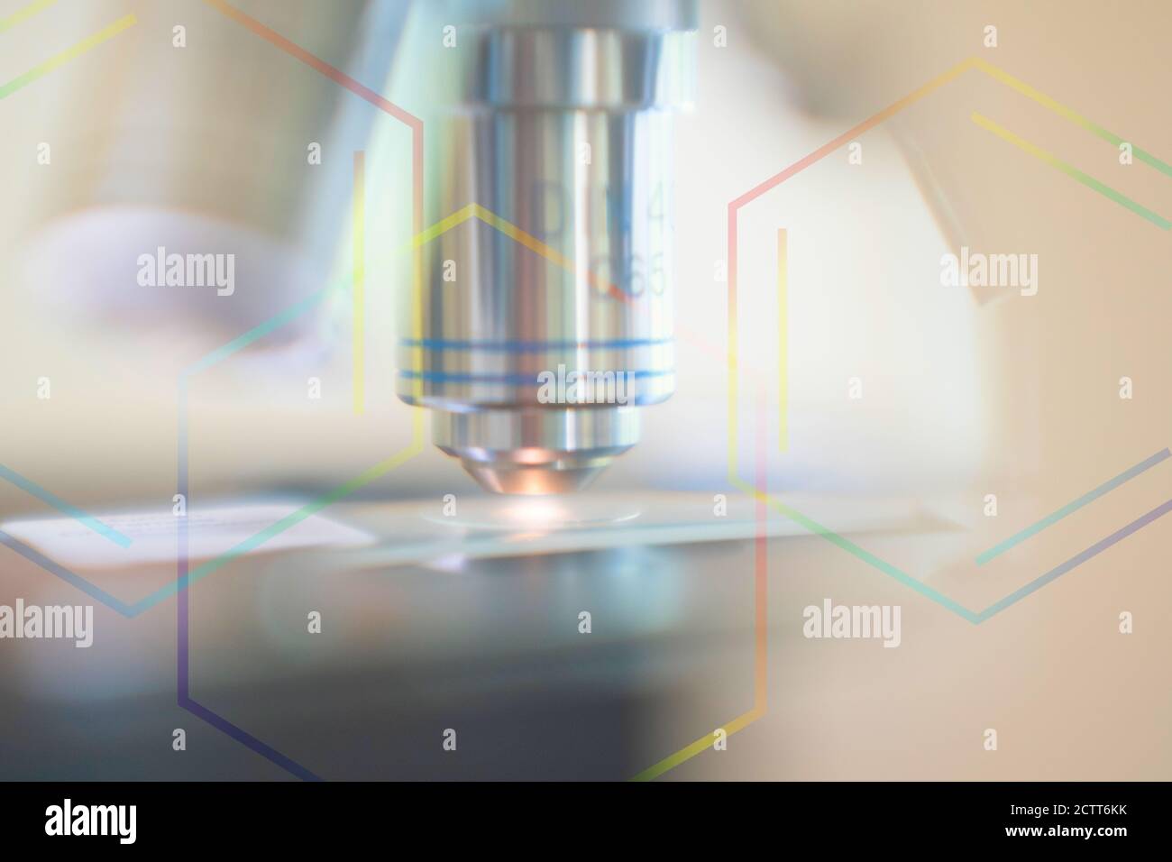 Close-up of laboratory microscope lens with chemical symbol Stock Photo ...