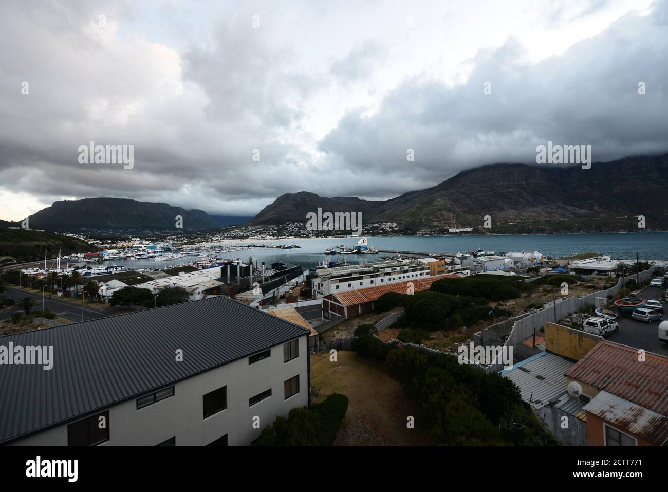 A view of Hout Bay and the mountains behind Stock Photo - Alamy