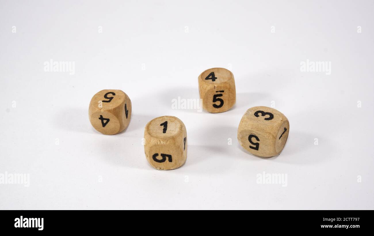 Four wooden dice on white background Stock Photo - Alamy