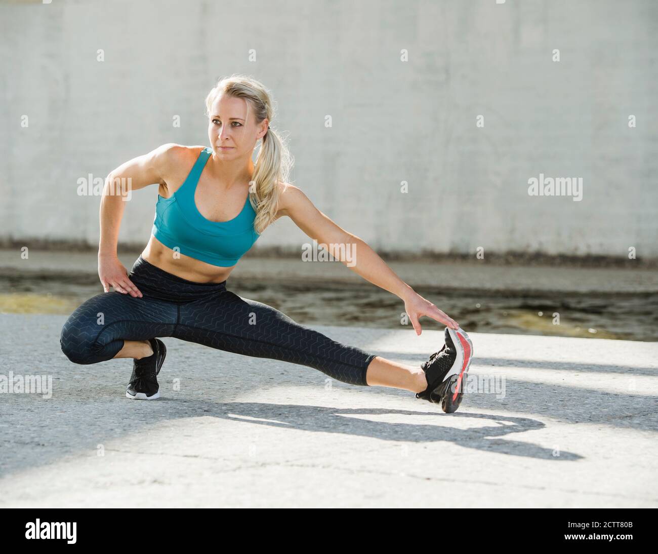Full length stretching hi-res stock photography and images - Alamy