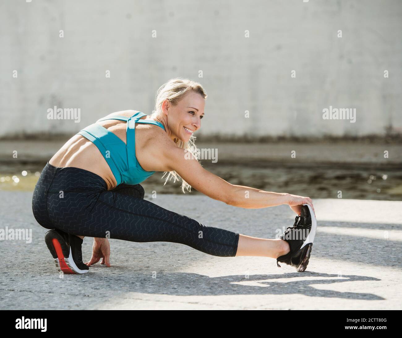 Full length stretching hi-res stock photography and images - Alamy